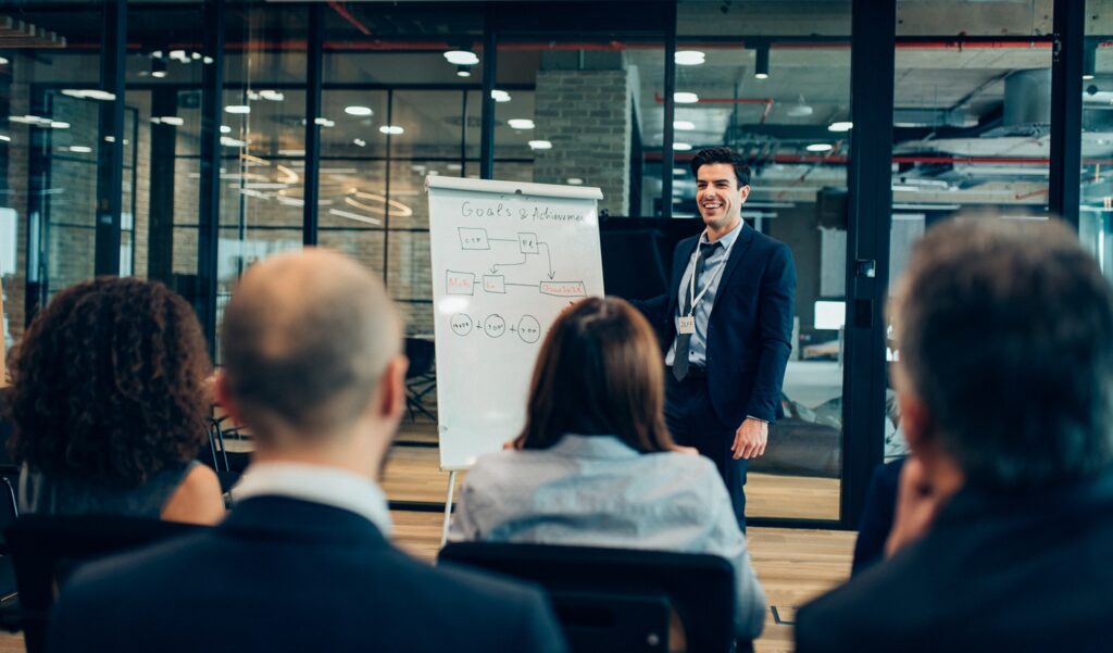 Integrating AI and Human Coaches for Seamless Leadership Coaching